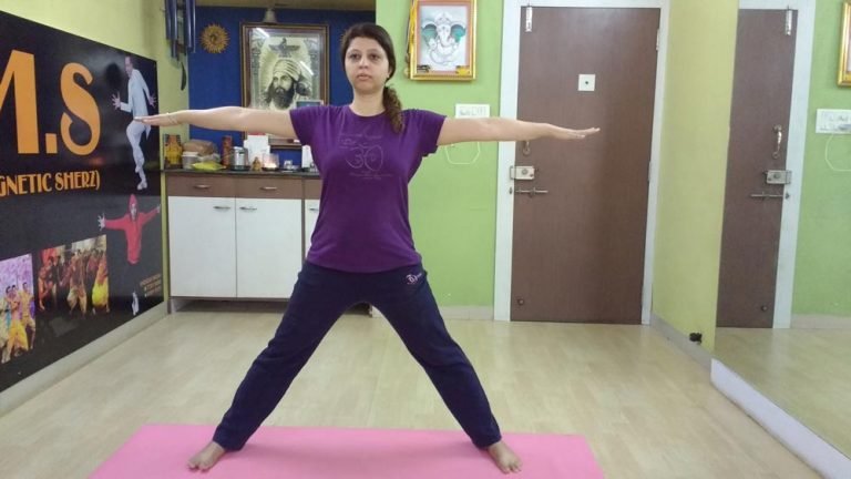 Kati Chakrasana (Standing Spinal Twist) Yoga Pose
