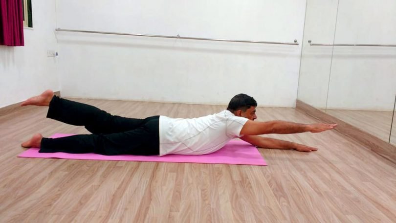 Ardha Salabhasana {Half Locust Yoga Pose} Steps & Benefits